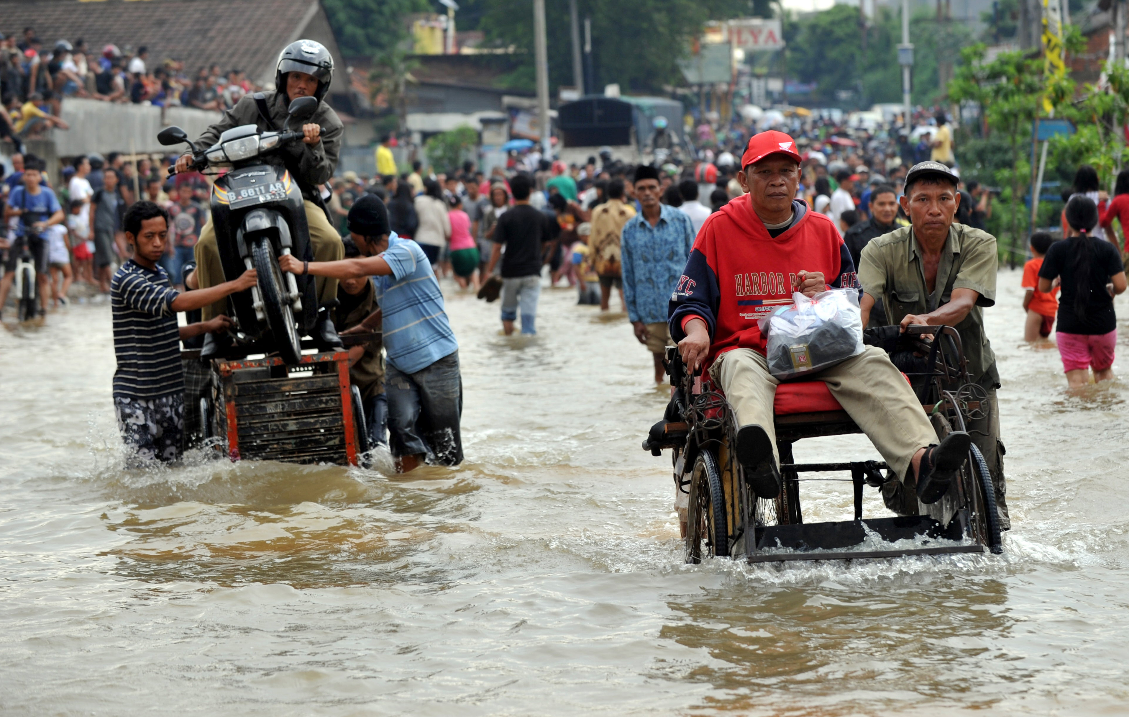 In Photos: Indonesia’s Dual Disasters | PBS NewsHour