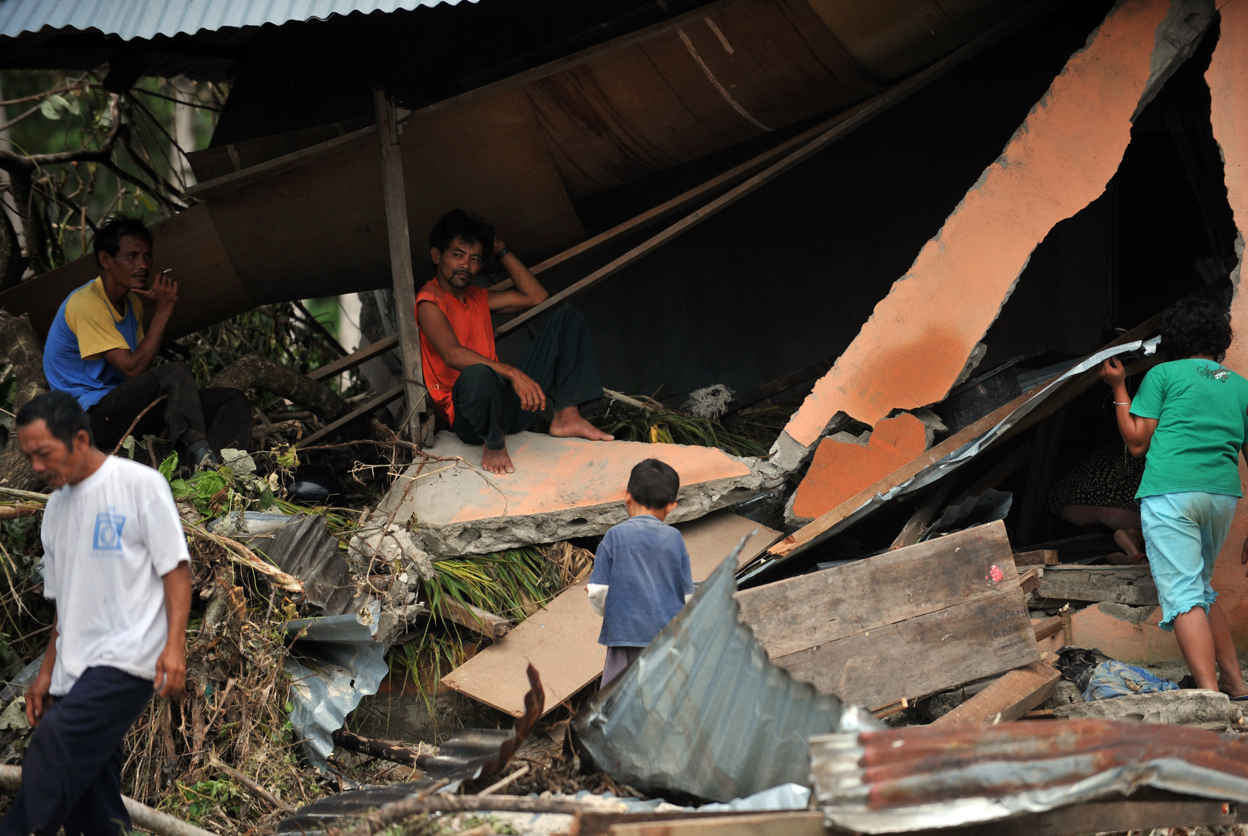 In Photos: Indonesia’s Dual Disasters | PBS News